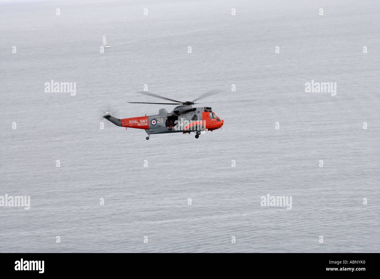 royal navy rescue sea king helicopter on patrol over the south coast of ...