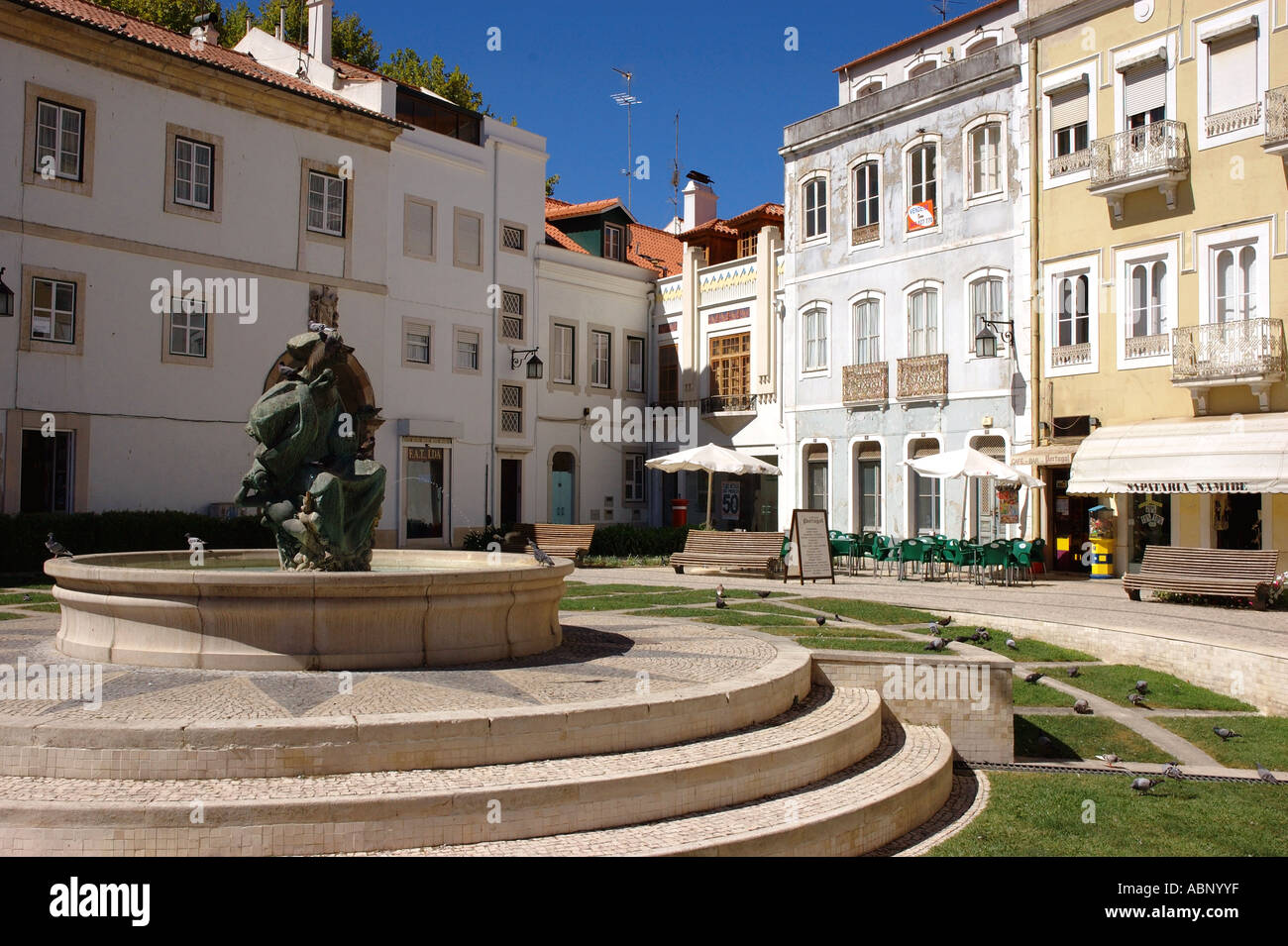 View of little square in old town centre typical colourful buildings ...