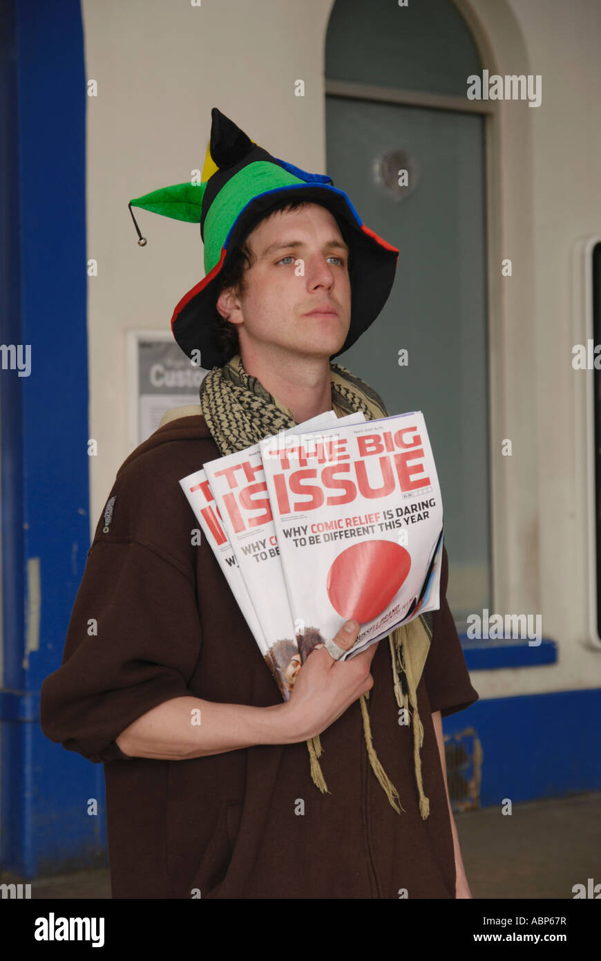 man selling big issue magazine outside Brighton railway station East ...