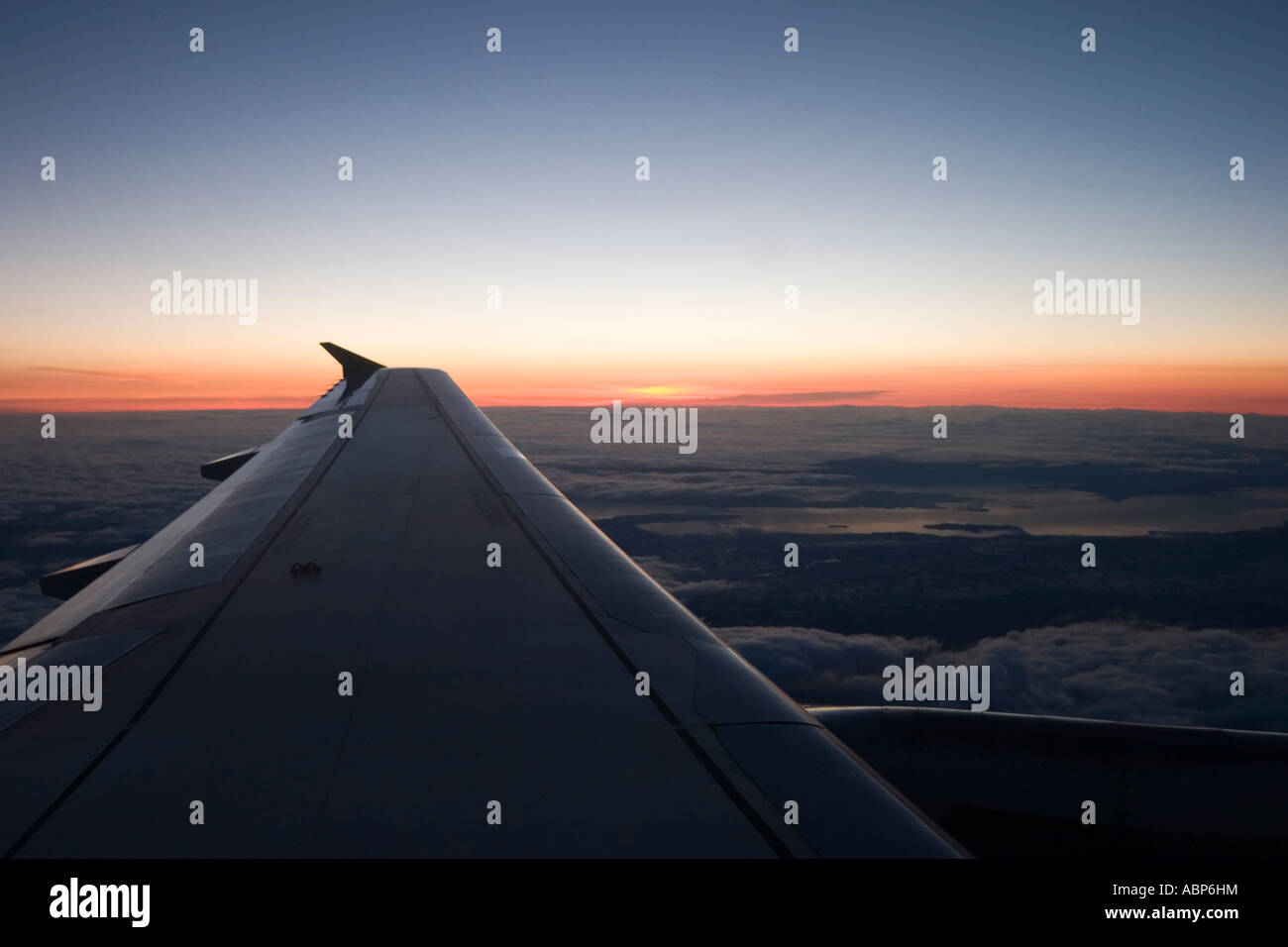 Sunrise seen from plane hi-res stock photography and images - Alamy