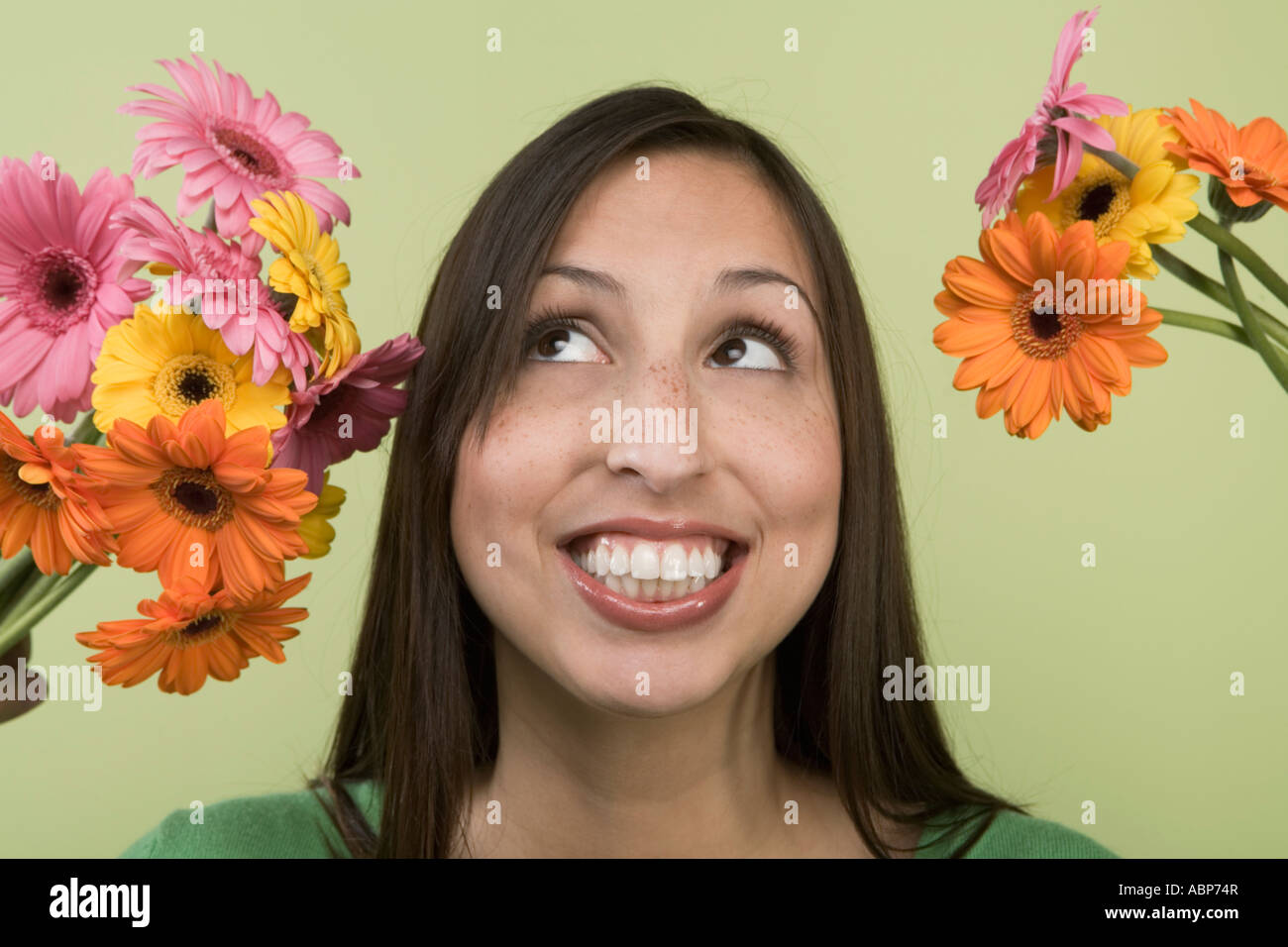 Woman surrounded by flowers Stock Photo - Alamy