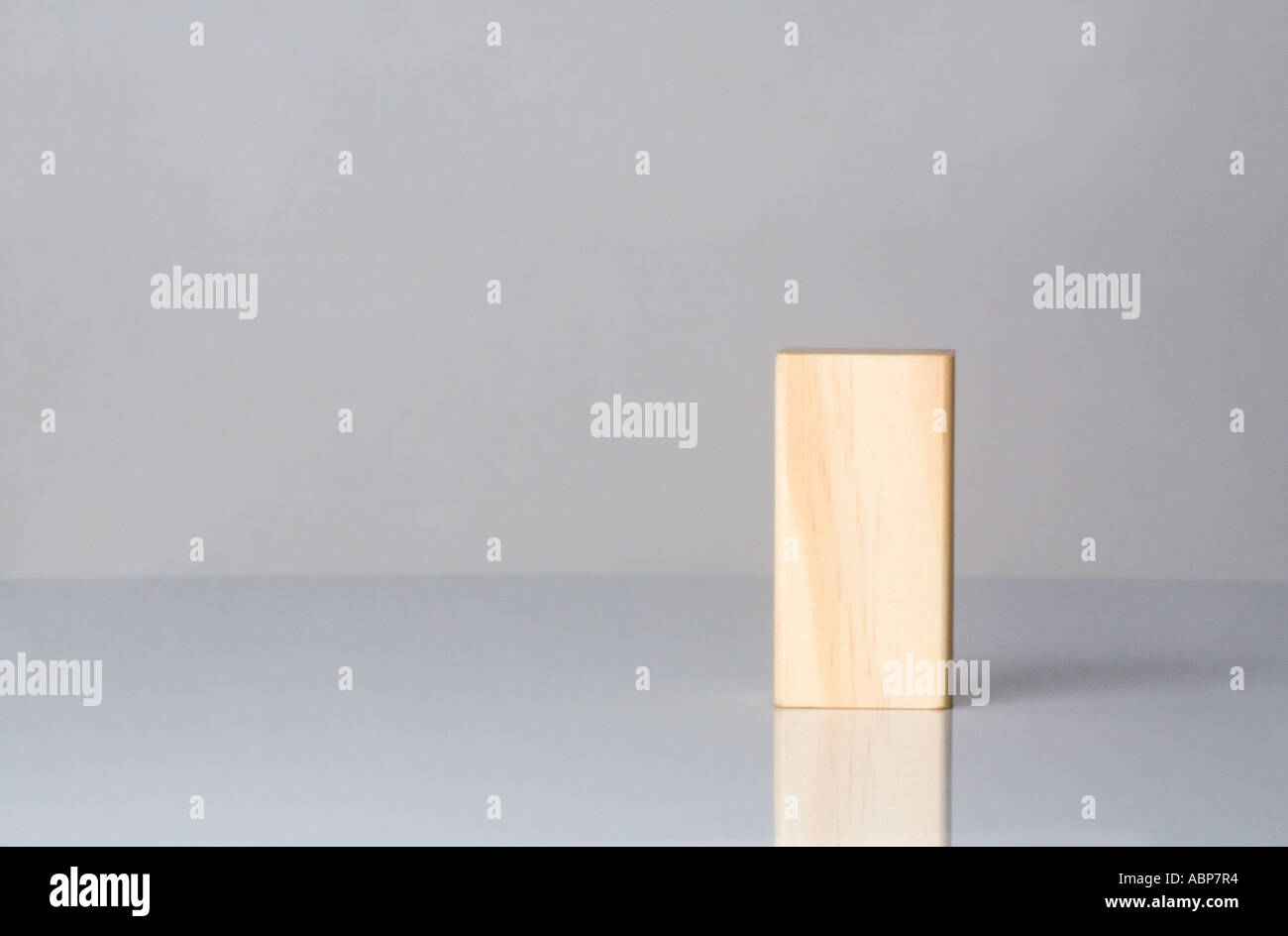 1 single childs retangle block standing upright and all alone on a ...