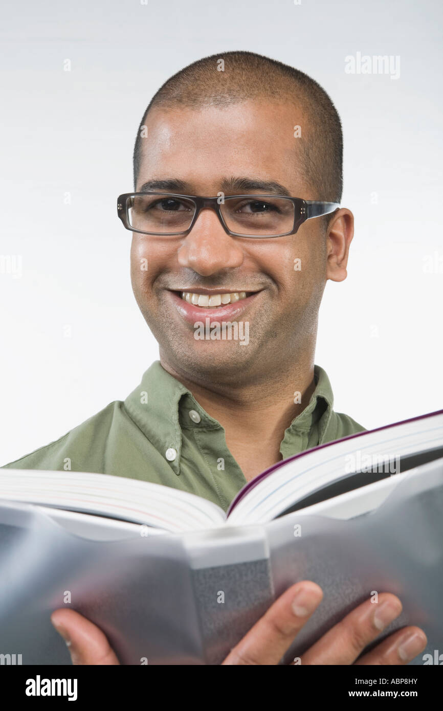 Man reading a book Stock Photo - Alamy