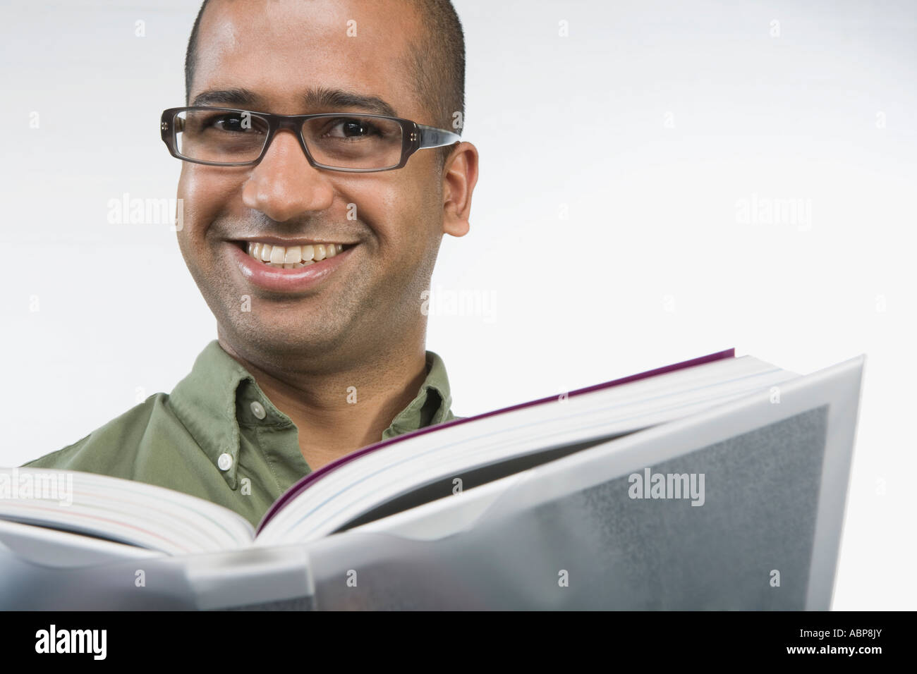 Man reading a book Stock Photo - Alamy