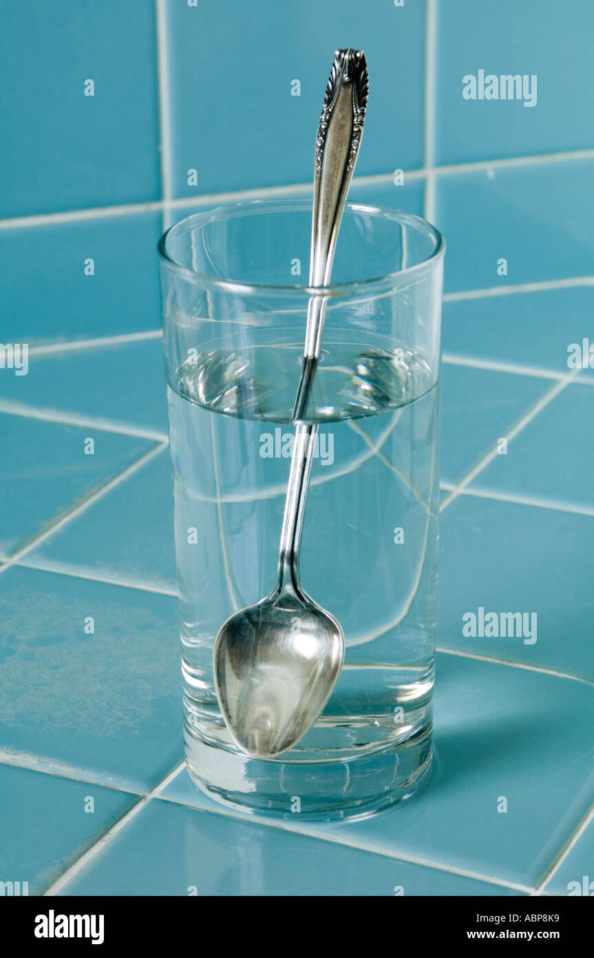 Spoon glass clear drinking water hi-res stock photography and images ...