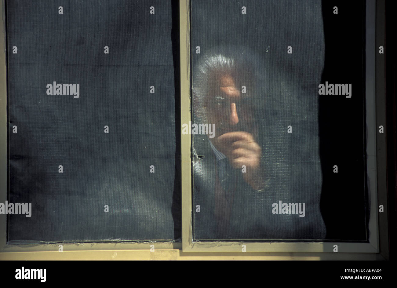 Old man at the window Stock Photo - Alamy