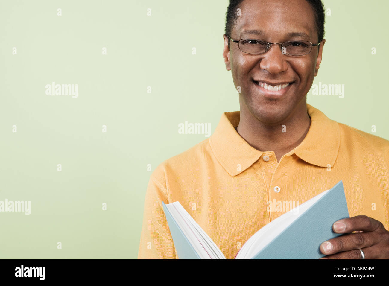 Man reading book Stock Photo - Alamy