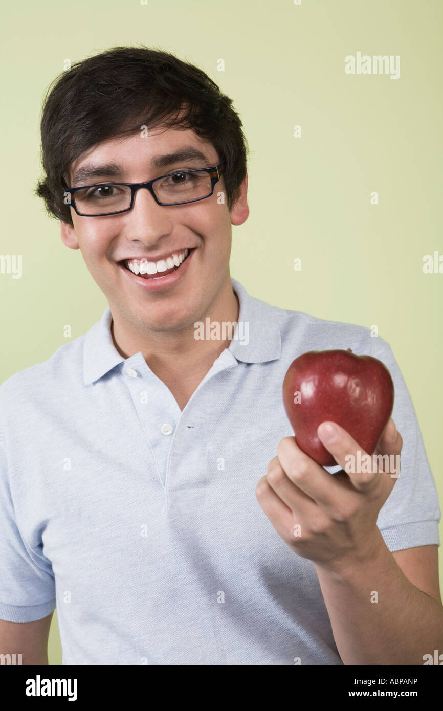 Man holding apple Stock Photo - Alamy