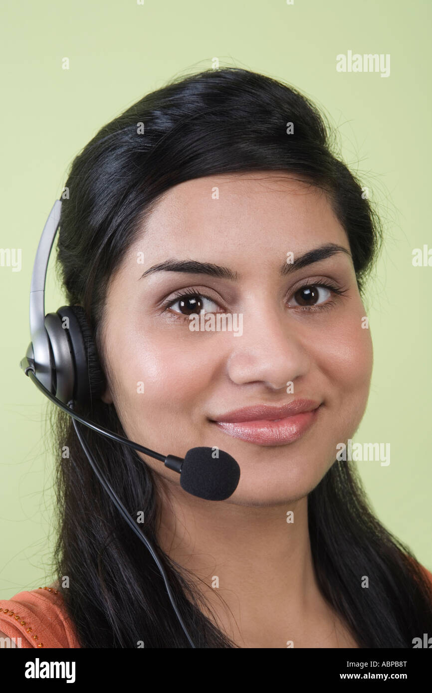 Woman wearing headset Stock Photo - Alamy