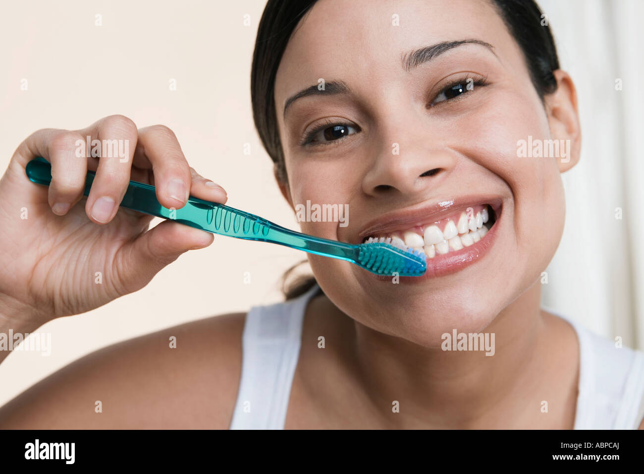 Woman brushing her teeth Stock Photo - Alamy