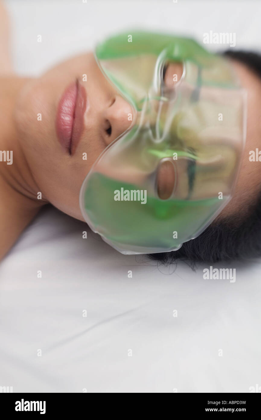 Woman wearing gel mask Stock Photo - Alamy