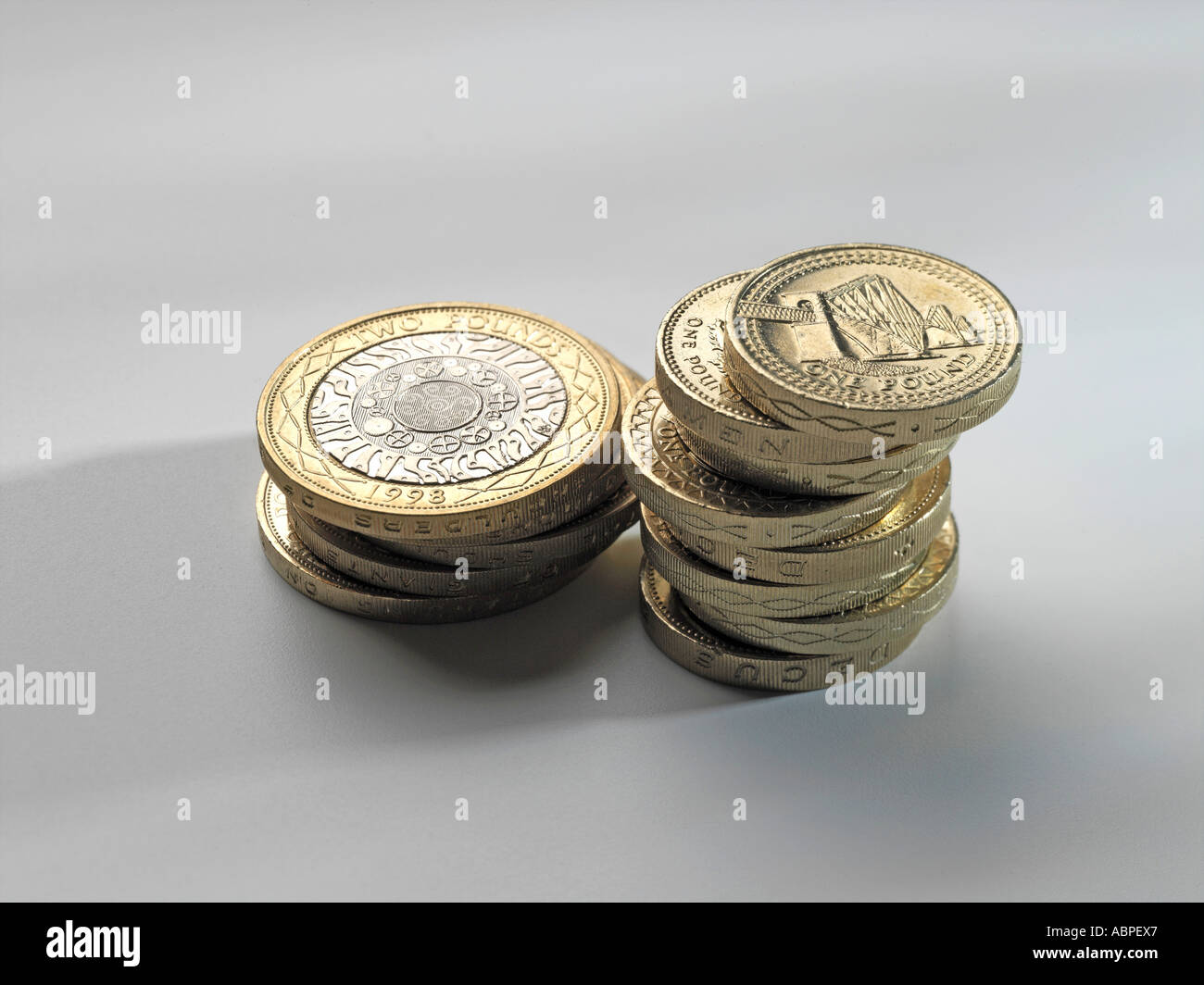 3 piles of coins hi-res stock photography and images - Alamy