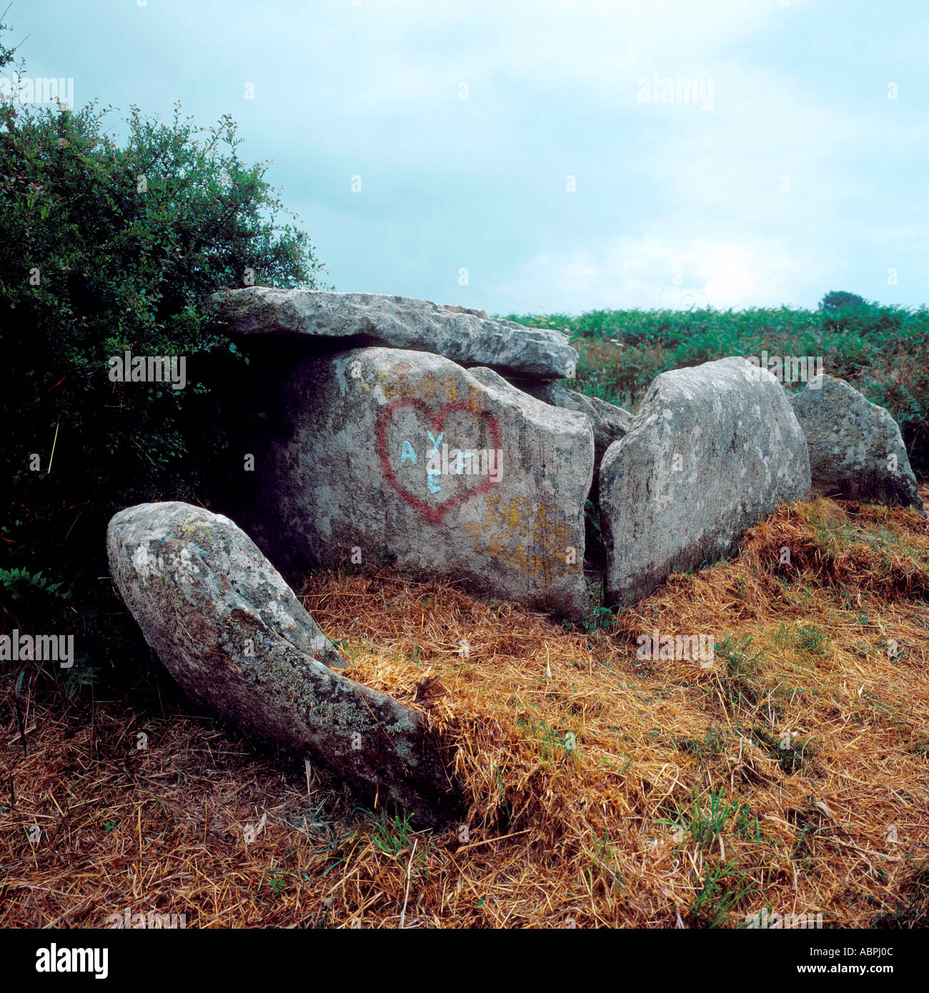 Modern graffiti on the remains of a neolithic tomb a dolmen on Ile ...
