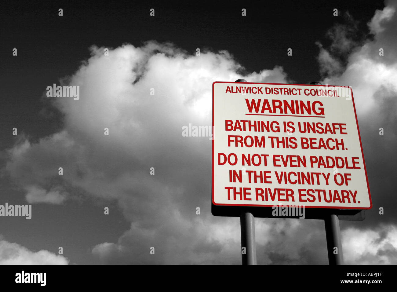 Bathing warning sign beside the estuary in Alnmouth Northumberland ...