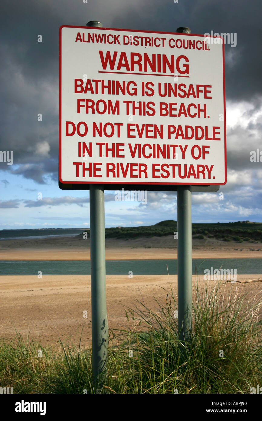 Bathing is unsafe warning sign beside the estuary in Alnmouth ...