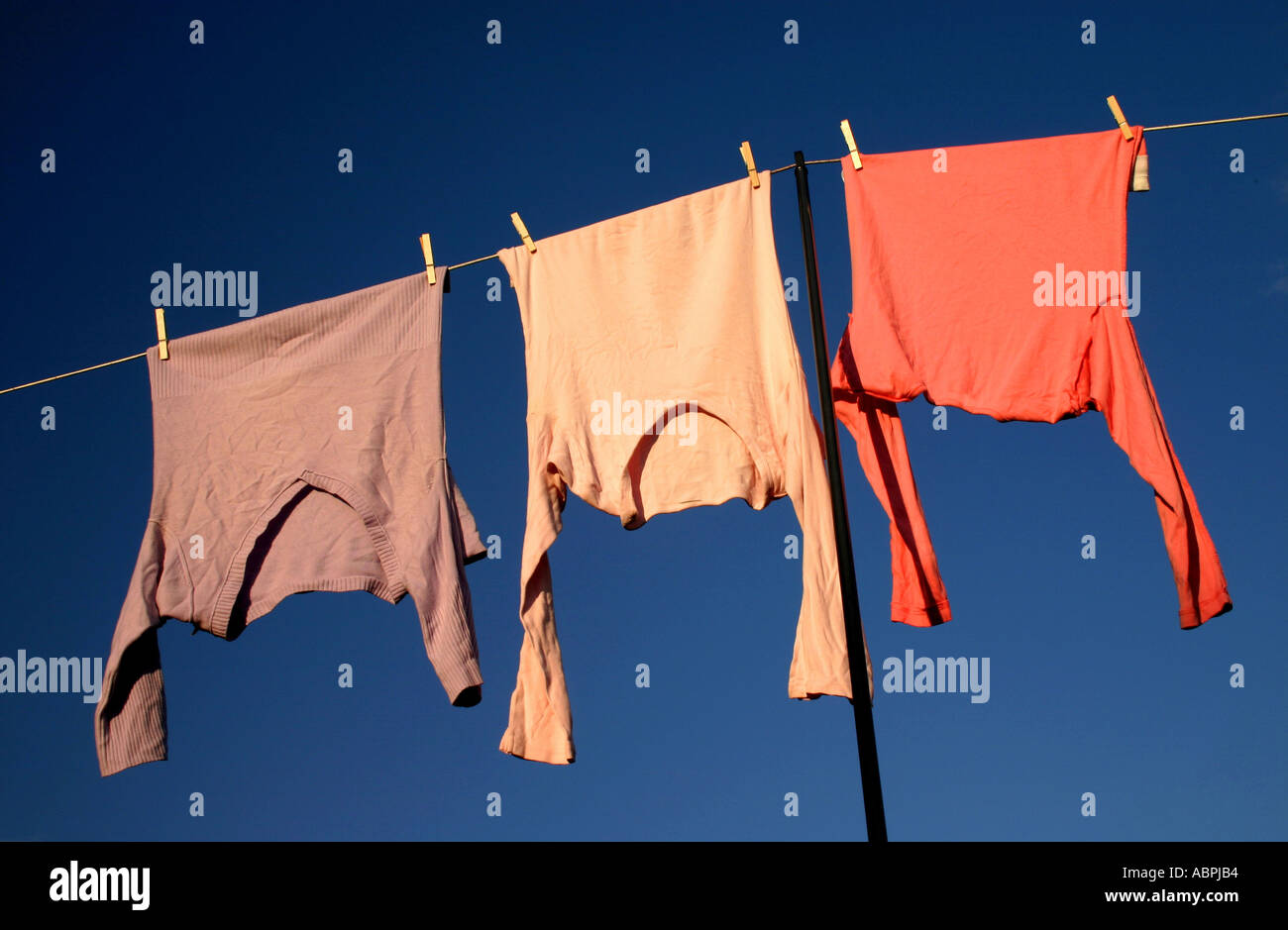 Laundry clothes drying on a washing line on a summers day Stock Photo ...