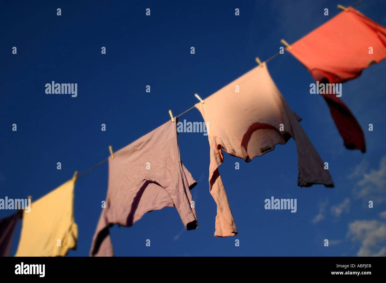 Laundry clothes drying on a washing line on a summers day Stock Photo ...
