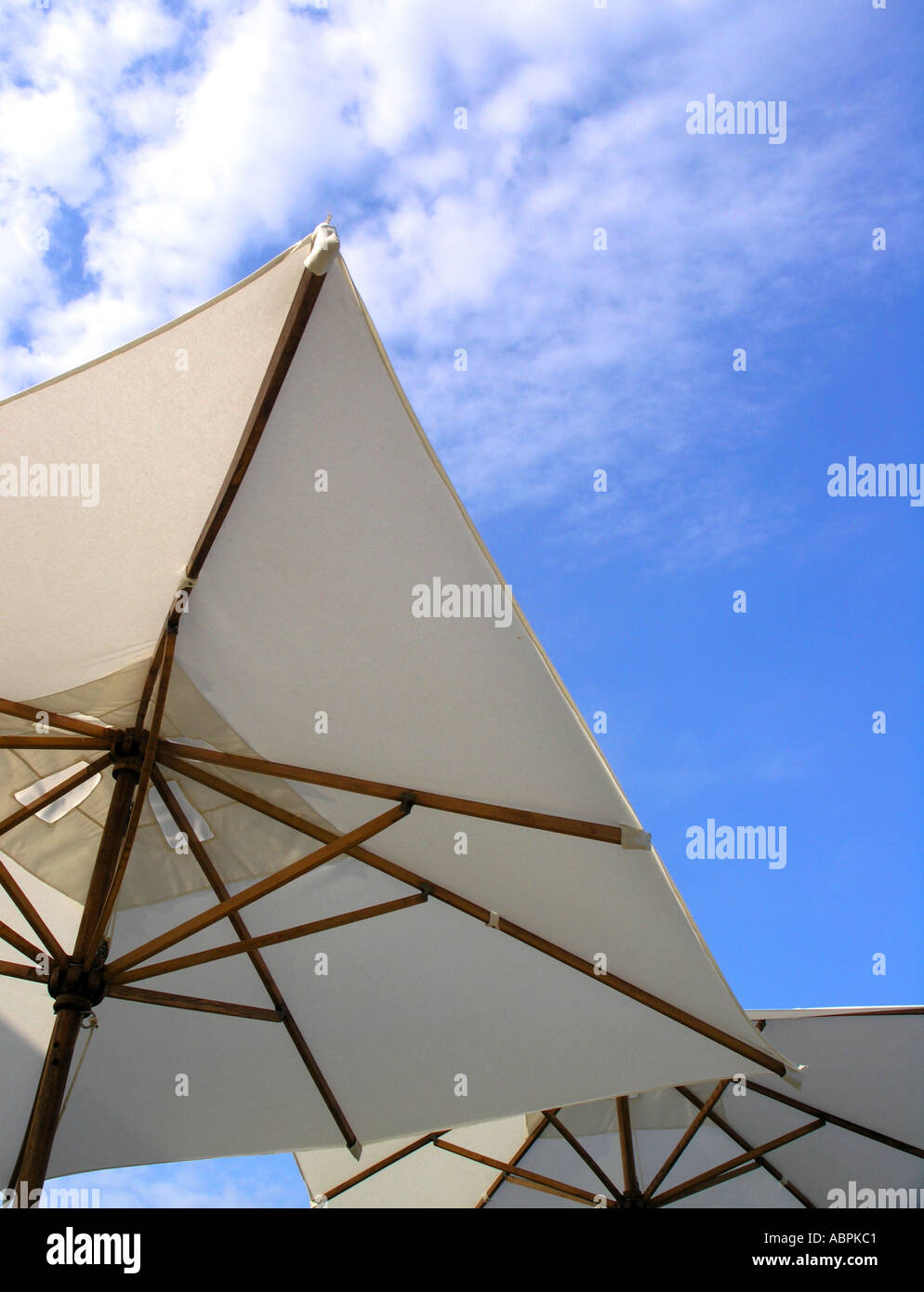Fabric Parasol with wooden frame Stock Photo - Alamy