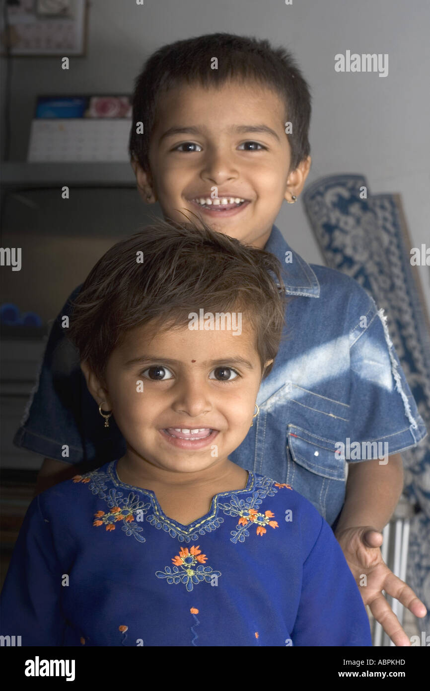 Brother sister standing close hi-res stock photography and images - Alamy