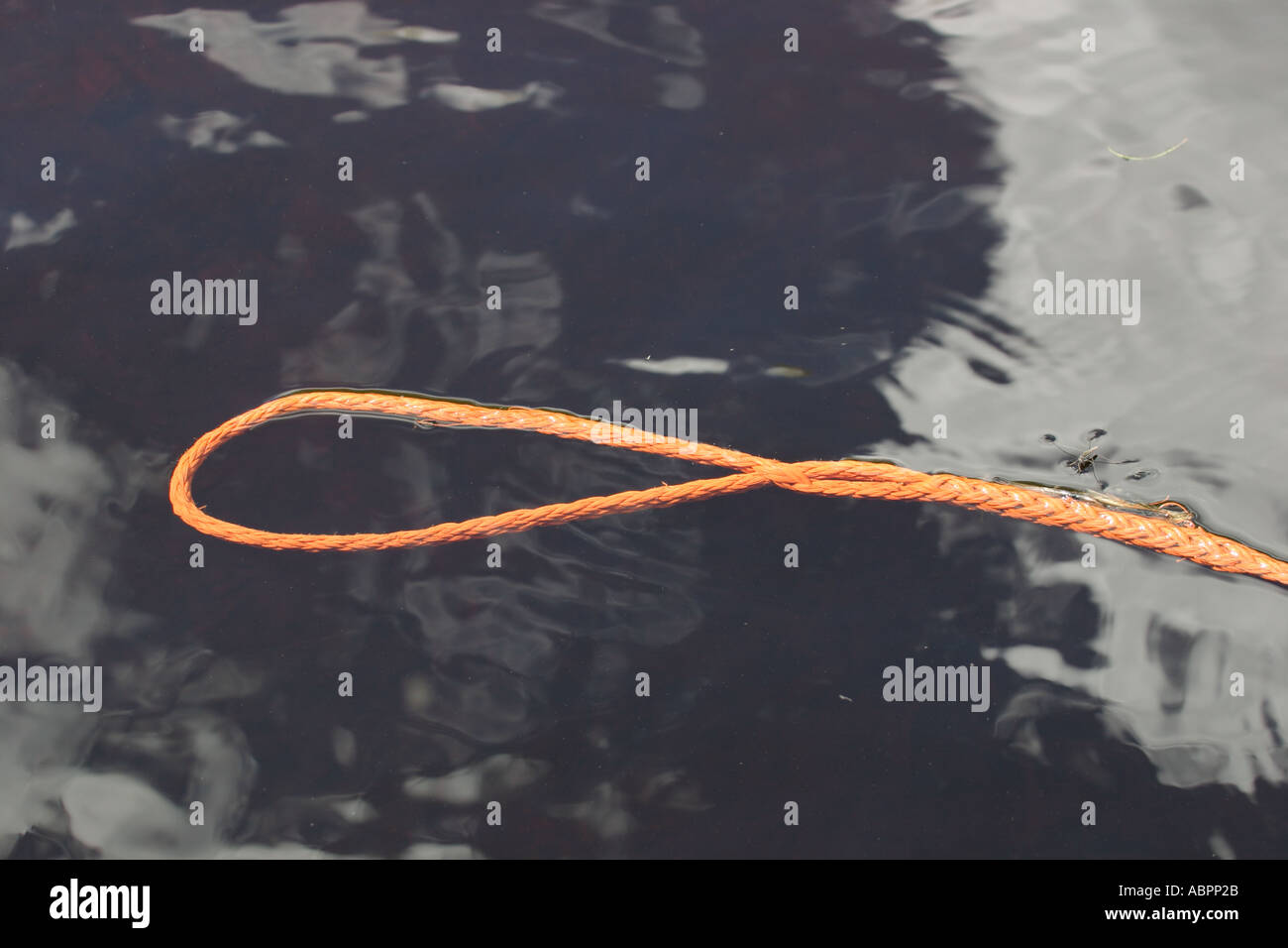 floating orange rope loop Stock Photo - Alamy