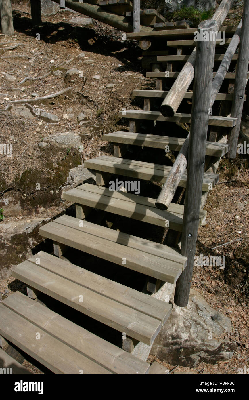 wooden steps going up hill Stock Photo - Alamy