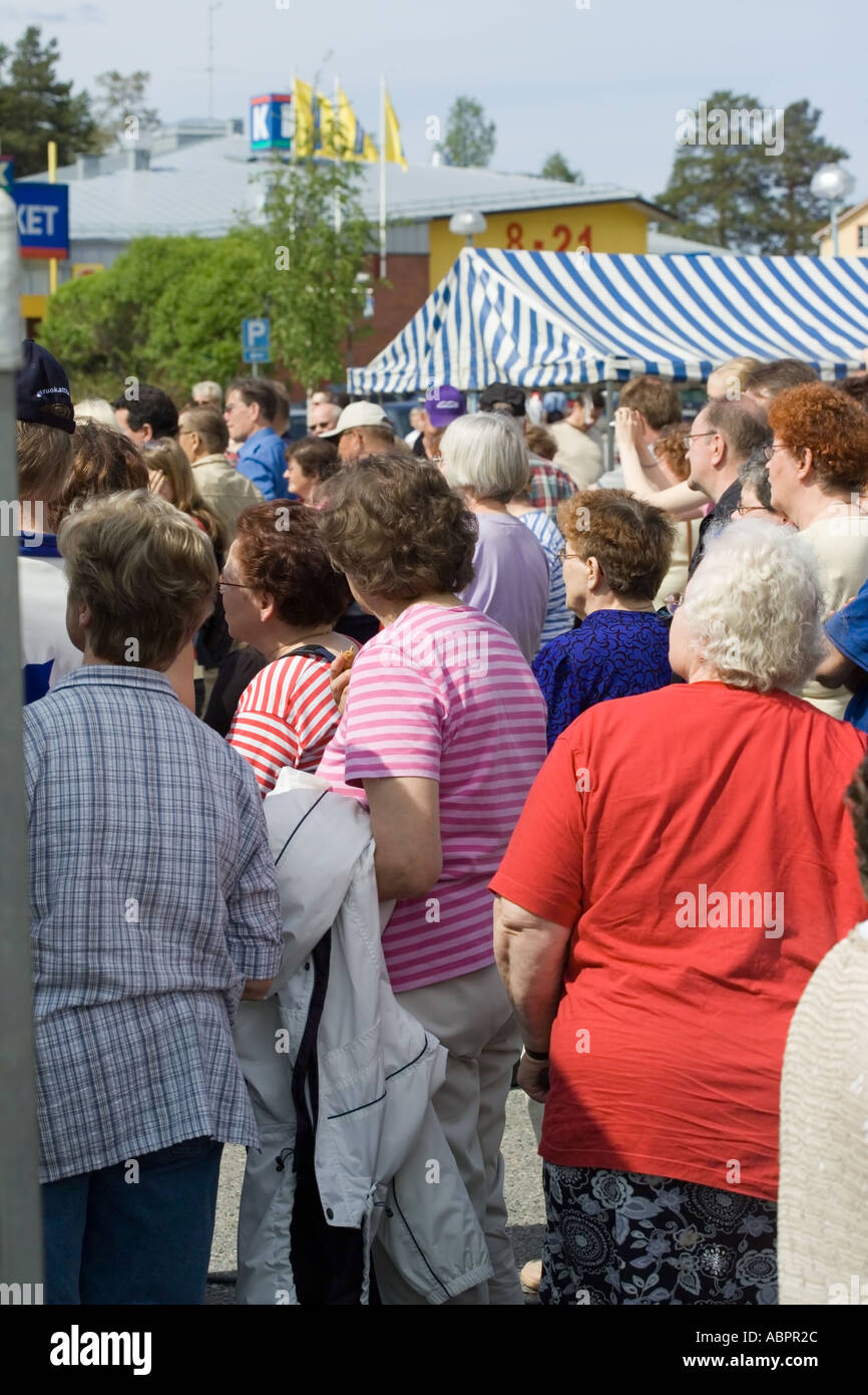 crowd of elderly people watching a show Stock Photo - Alamy