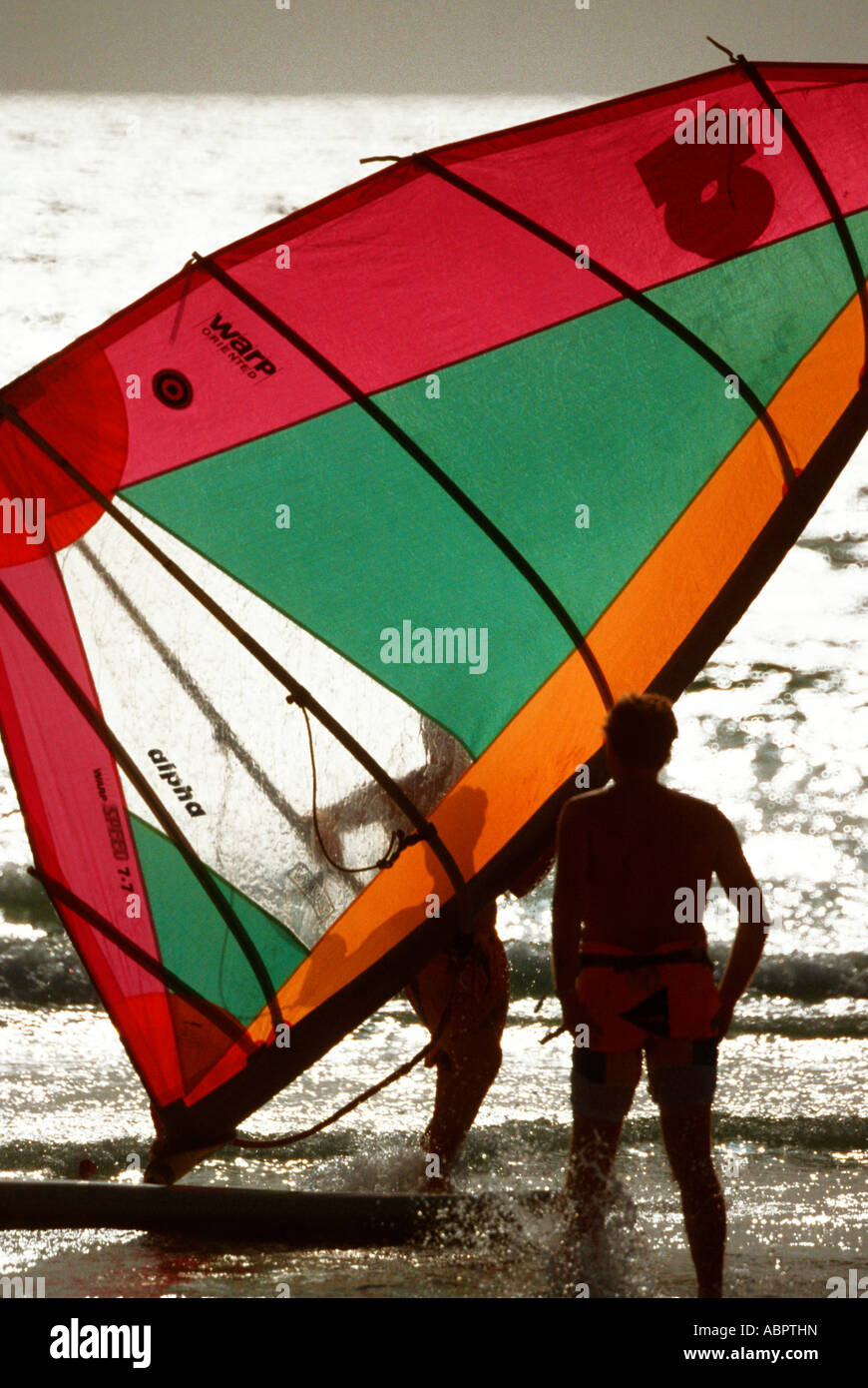 Colorful windsurfer on Florida beach Stock Photo - Alamy