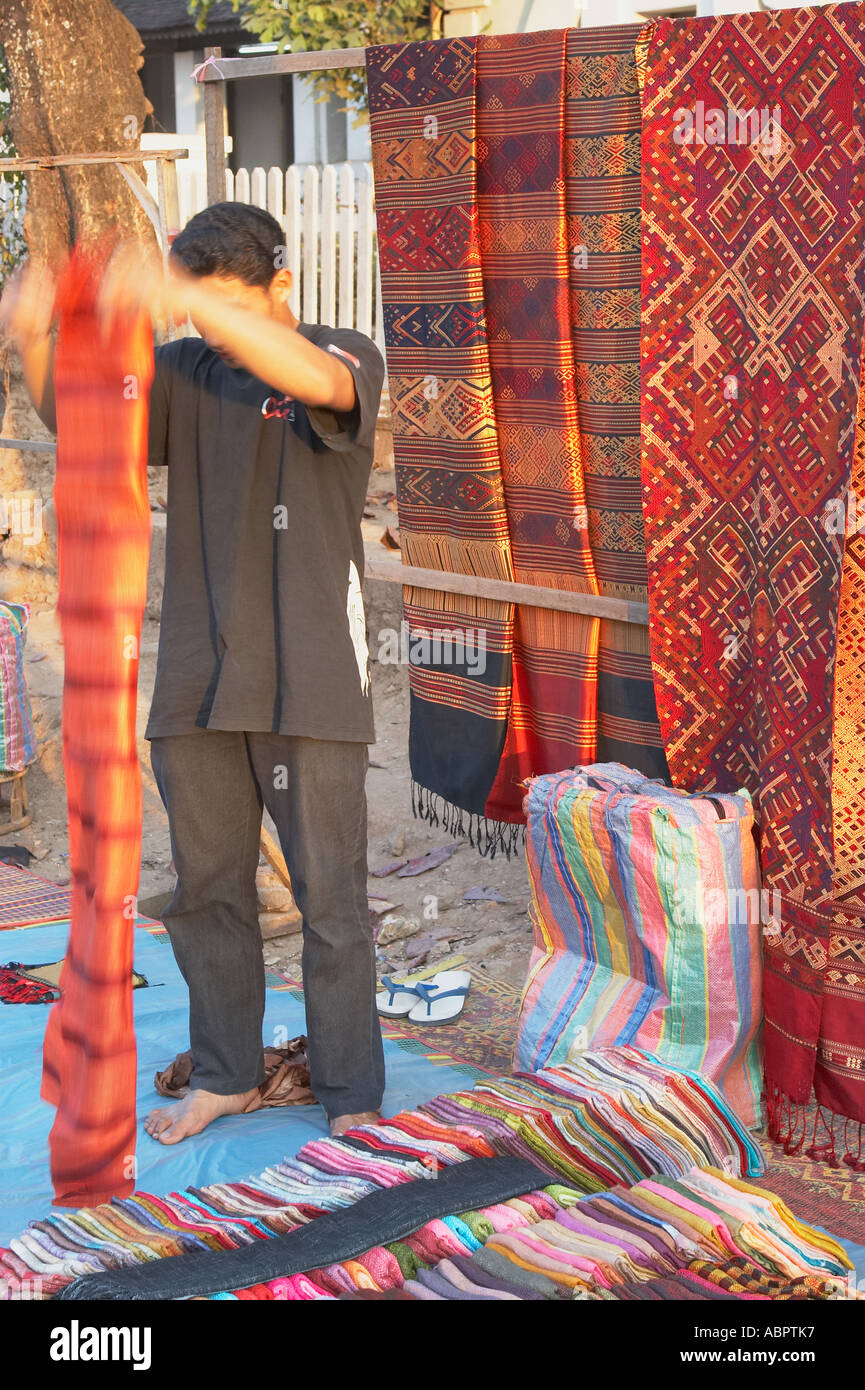Man Holding Up Silk Cloth Stock Photo - Alamy