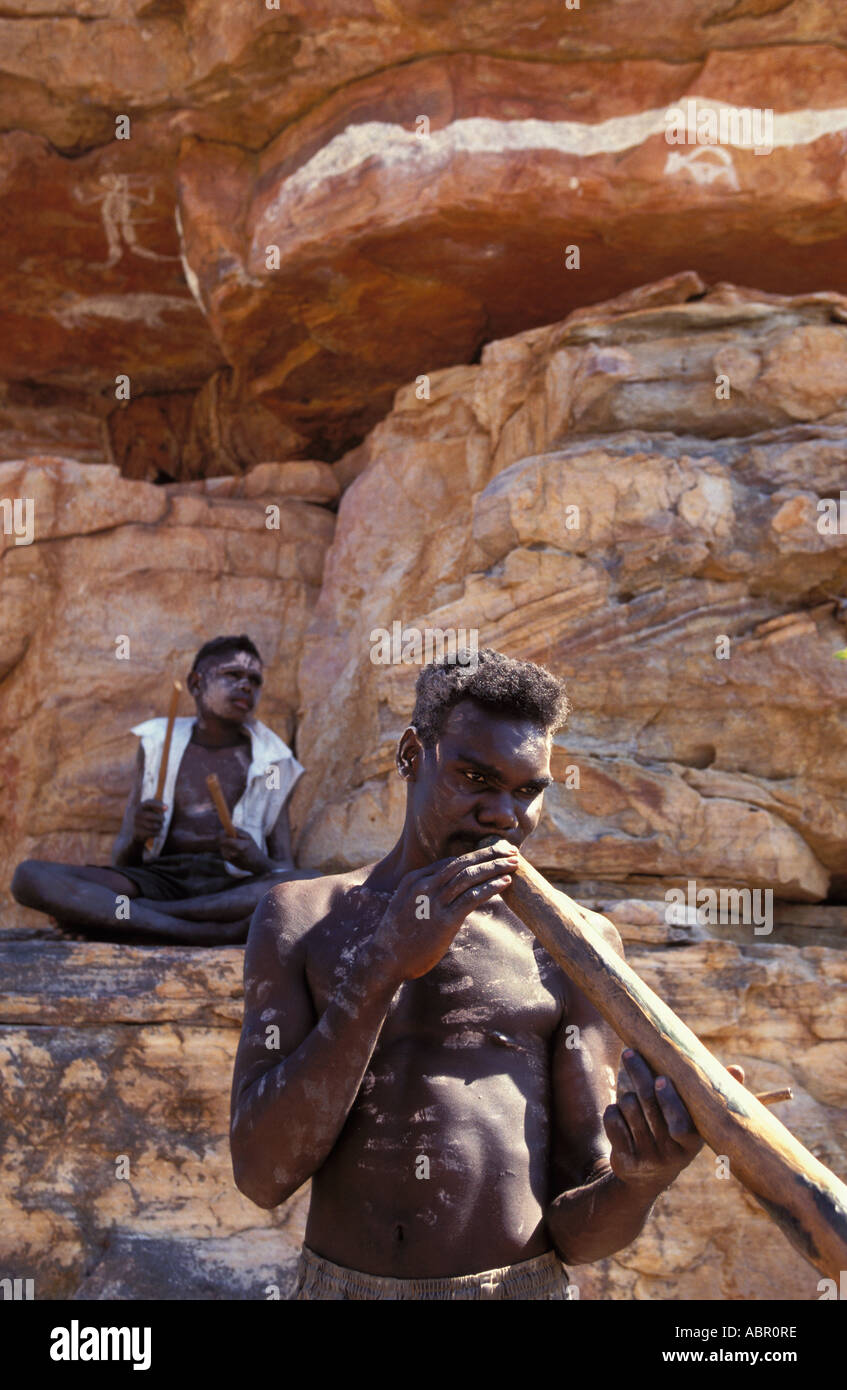 Aboriginal boys play didgeridu and clapsticks at Dukaladjarranj ...