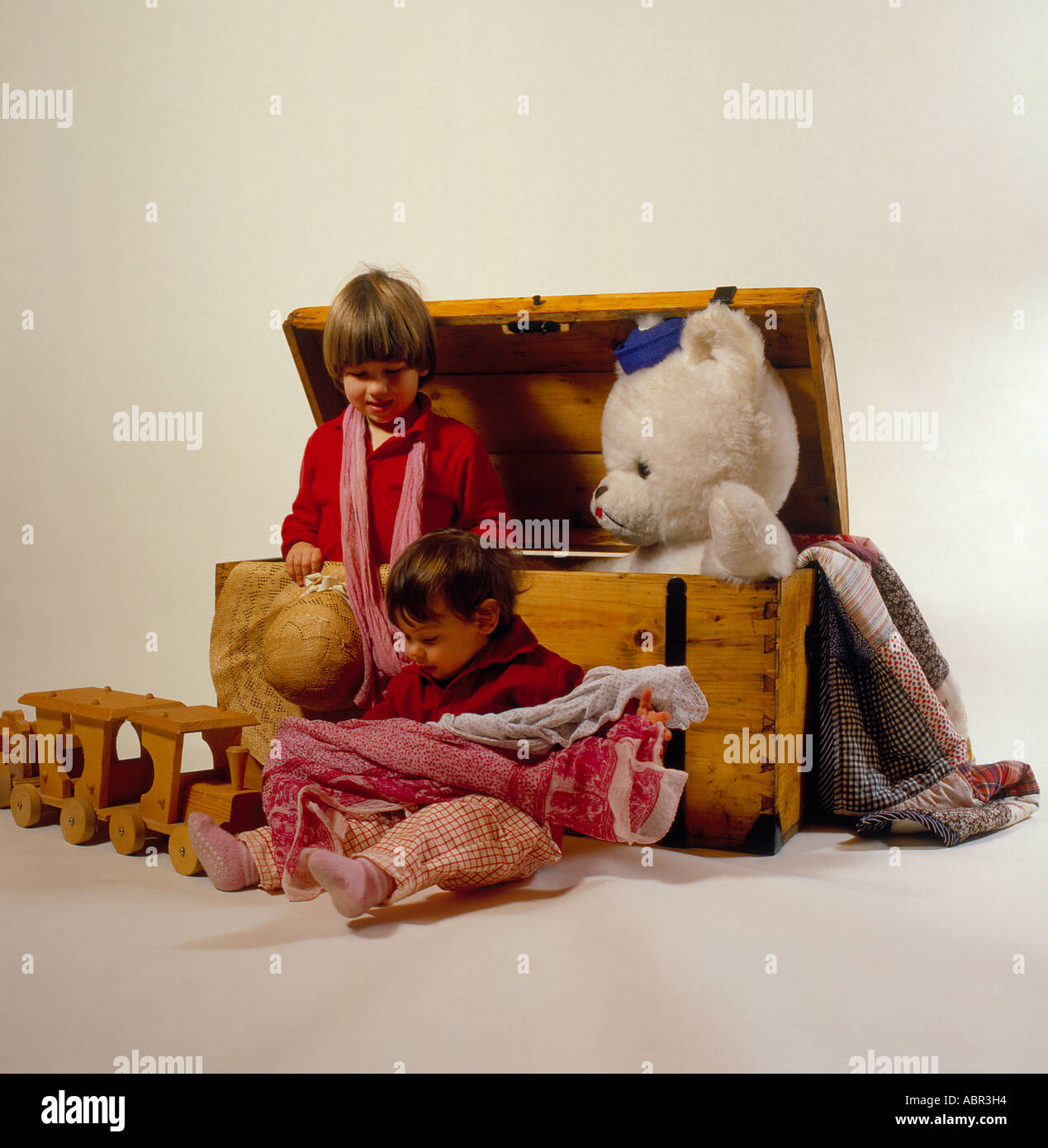 two children at play with a big wooden box. Photo by Willy Matheisl ...