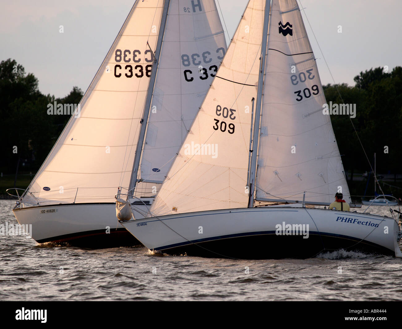 Two sailboats side by side Stock Photo - Alamy