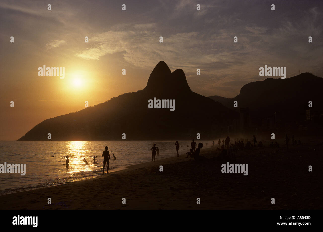 Rio de Janeiro, Brazil. Sun setting behind the Dois Irmaos (Two ...