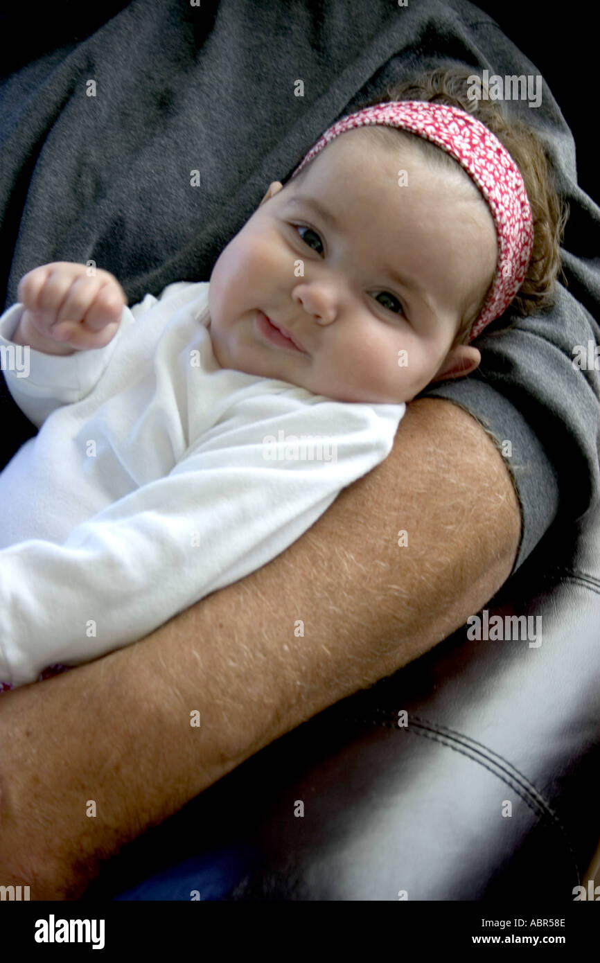 Three month old baby being Held Stock Photo - Alamy