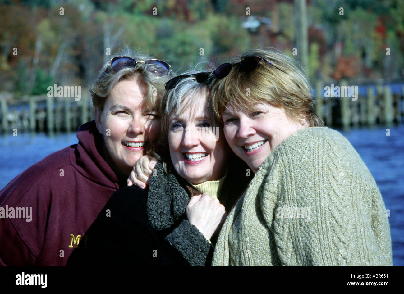 Three Women Friends Stock Photo - Alamy