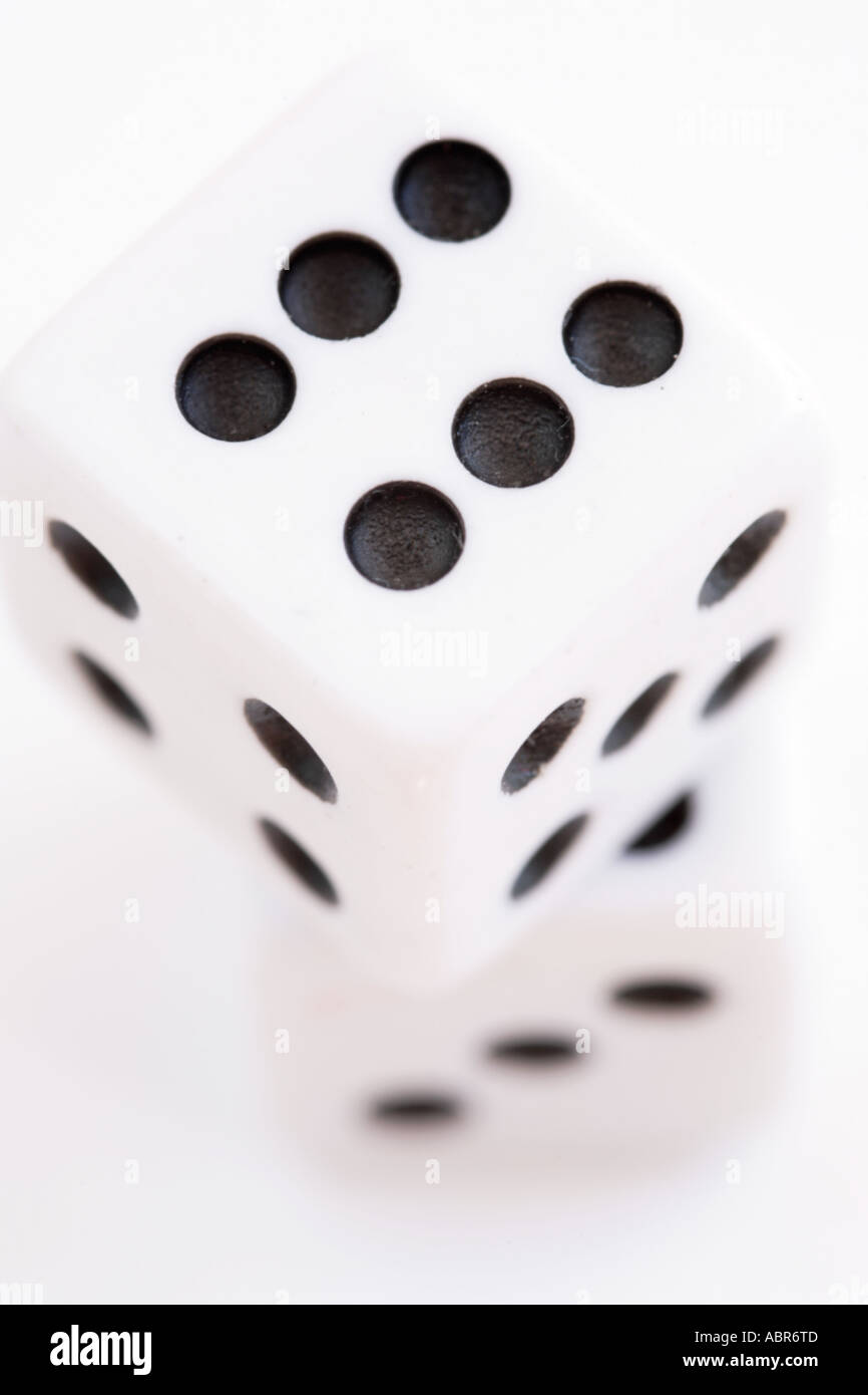 Pair of white dice on top of each other Stock Photo - Alamy