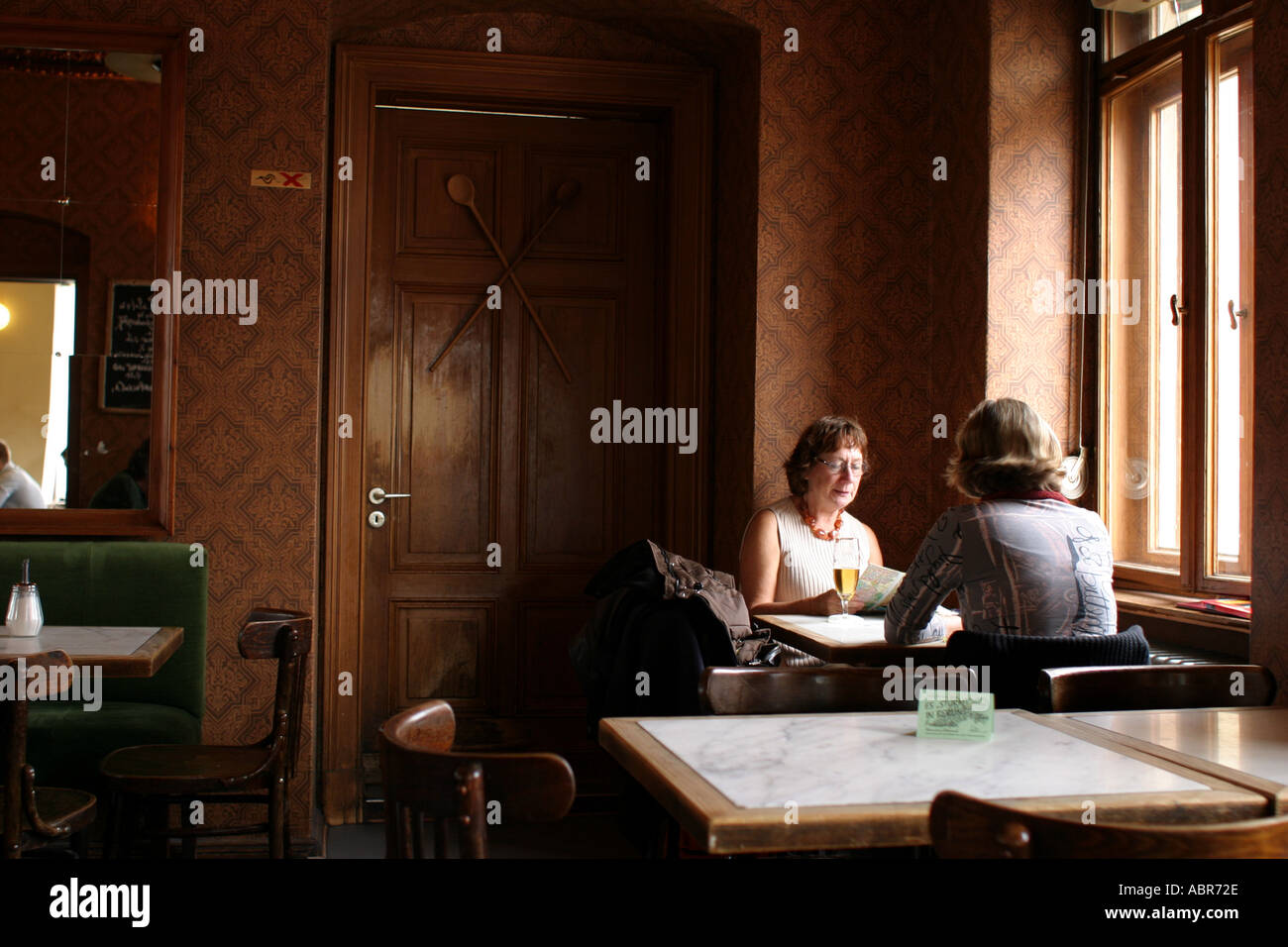 Cafe adler checkpoint charlie berlin hi-res stock photography and ...