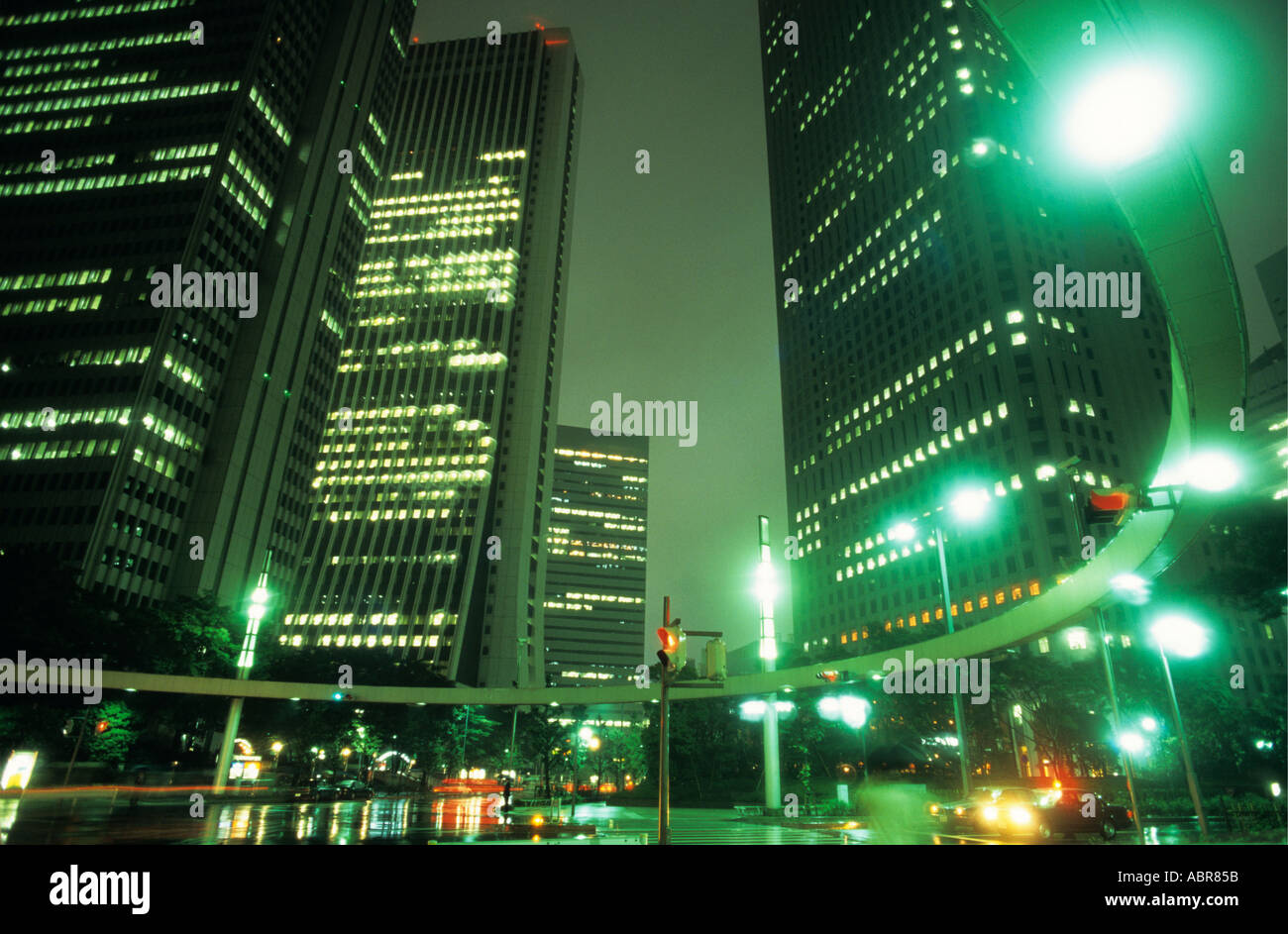 Street lighting and twinkling windows at night in the fast developing ...