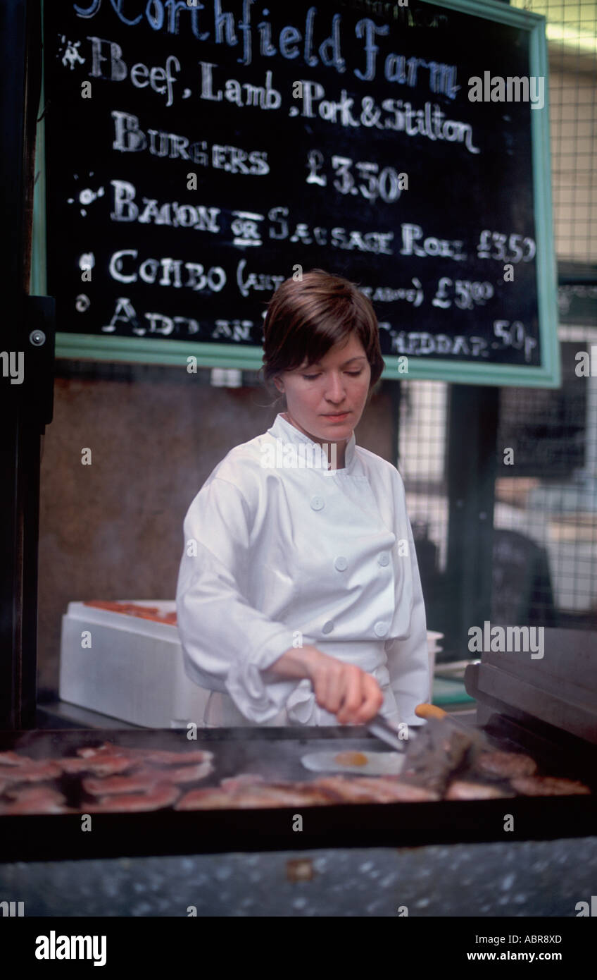 Woman frying bacon hi-res stock photography and images - Alamy