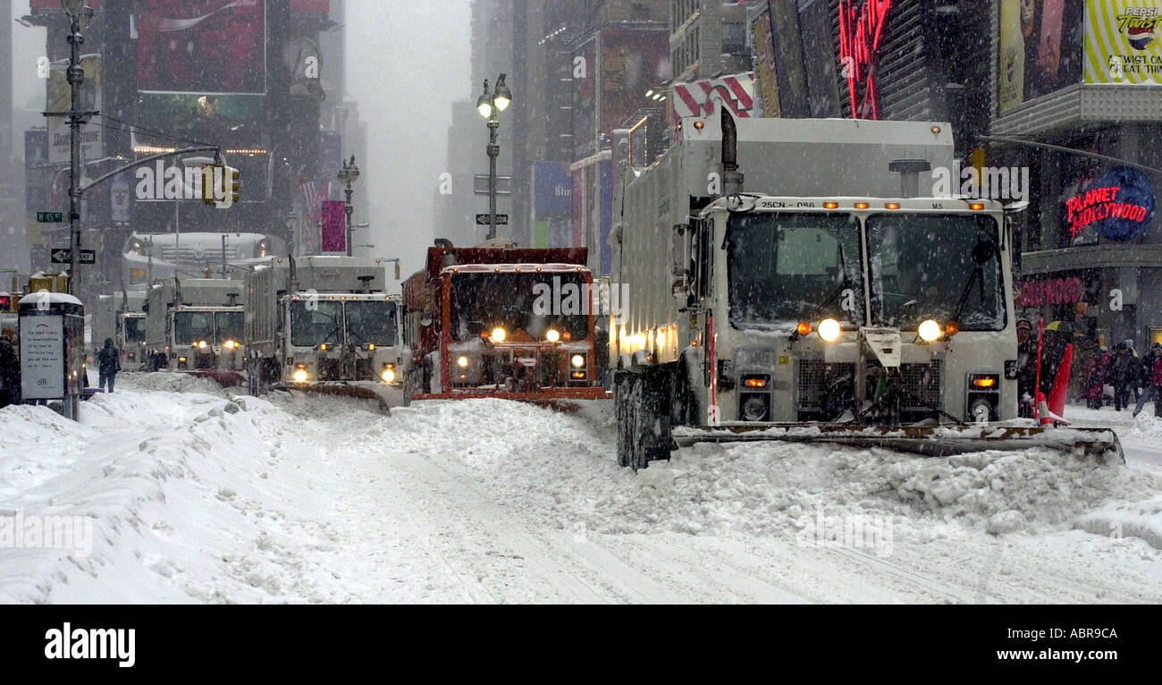 Snowplows plow snow during the Blizzard of 2003 in Times Square on ...