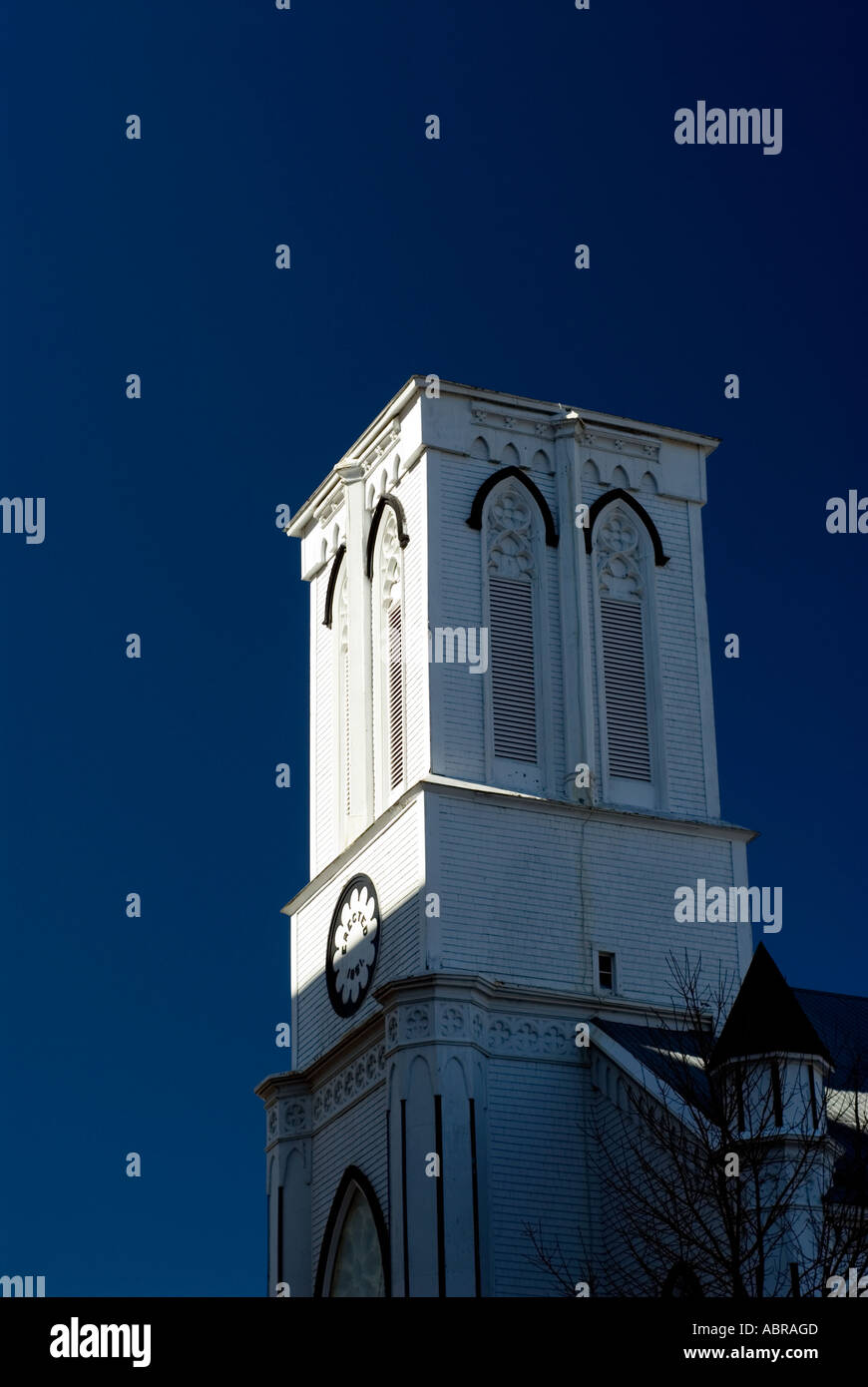 White clock tower of wooden Anglican Church Stock Photo - Alamy