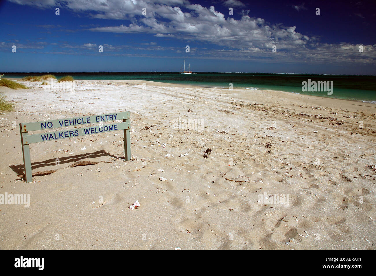 4WD tracks on beach passing No Vehicle Entry sign Point Maud Ningaloo ...