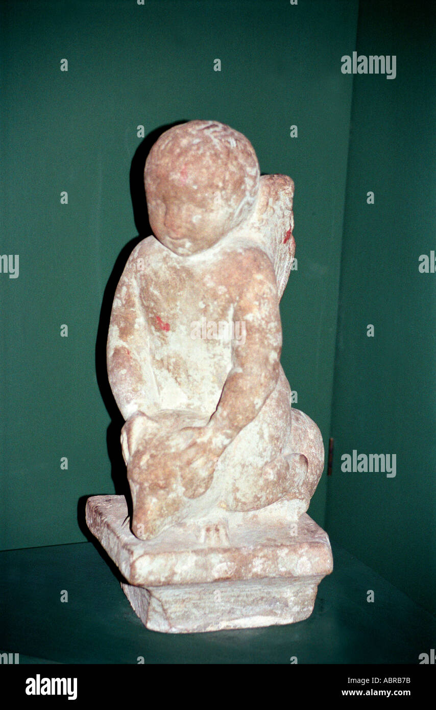 Ancient Etruscan funerary statue at a Tuscan village church Stock Photo ...