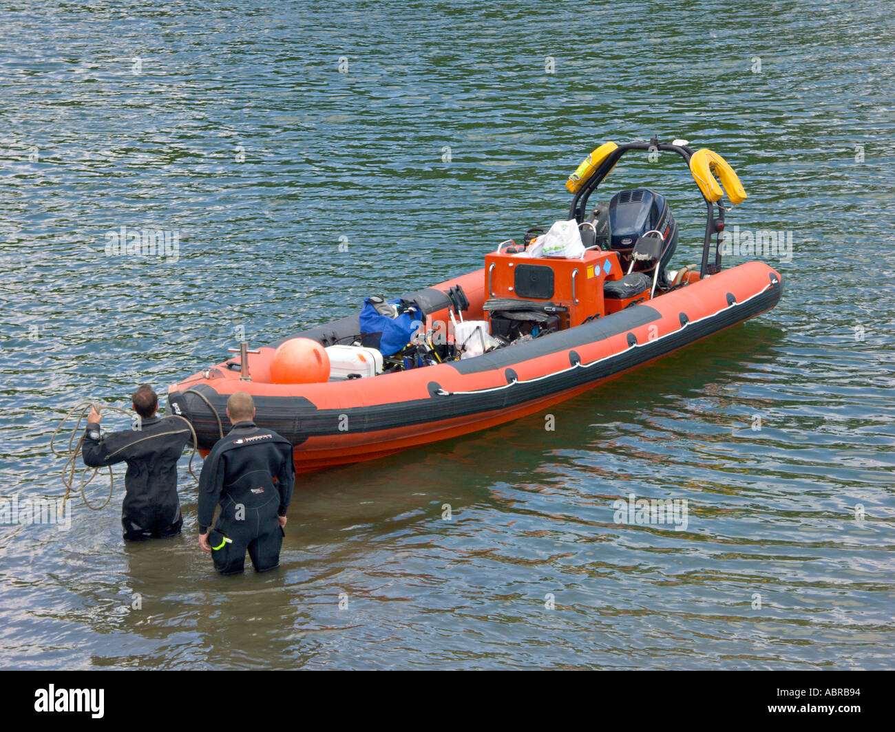SCUBA divers preparing for a dive Stock Photo - Alamy