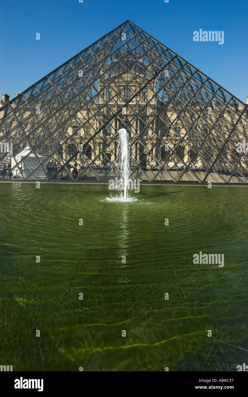 Fountain around large pyramid at the Louvre Museum Paris France Stock ...
