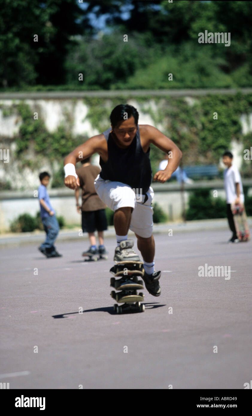 Man on multiple skateboards Paris France Stock Photo - Alamy