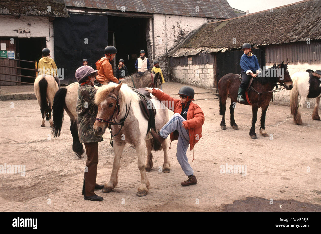 adventure outing primary students learning to ride ponies Stock Photo ...