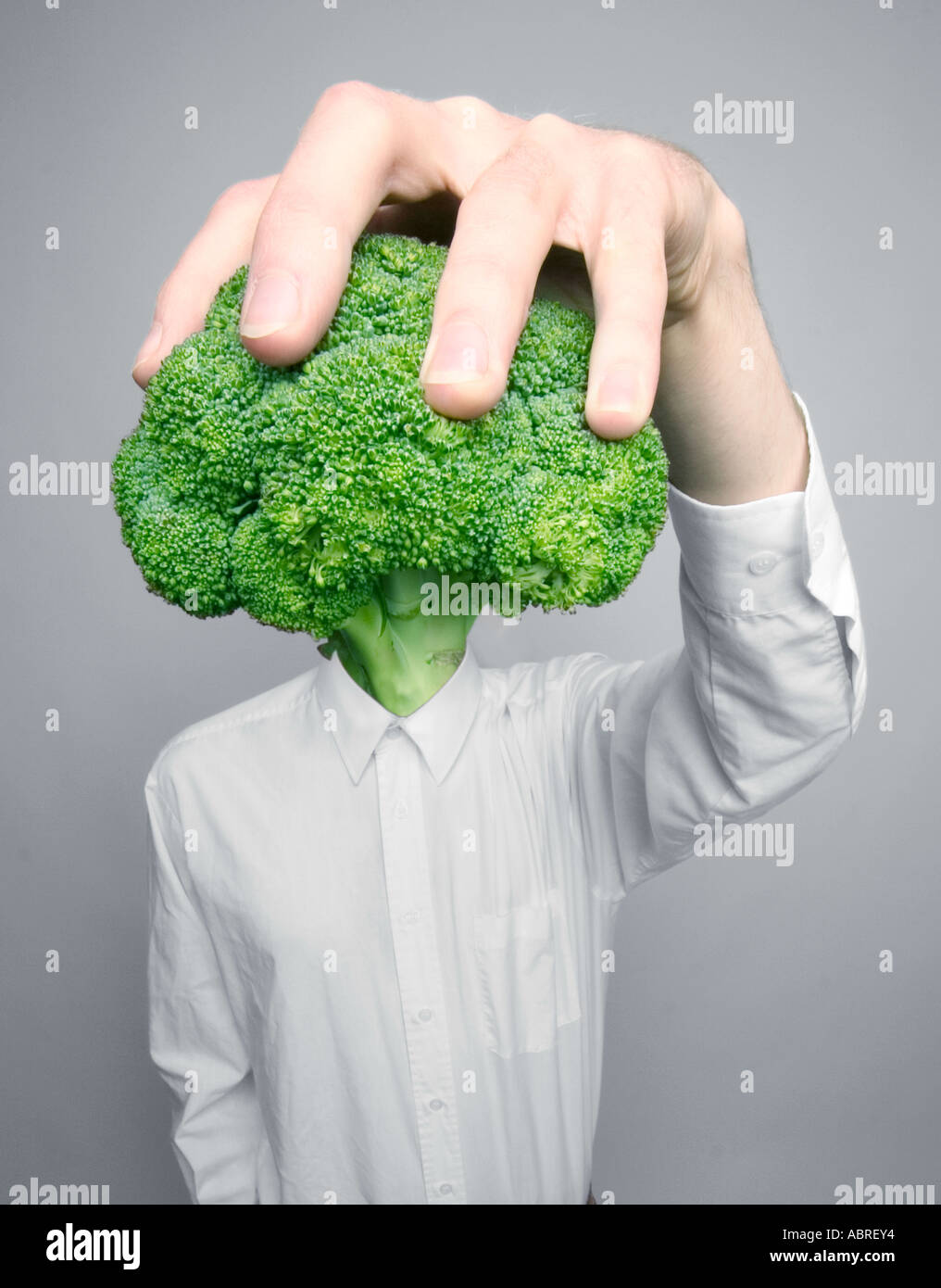 Broccoli Headed Man, Body on White Background Stock Photo - Alamy