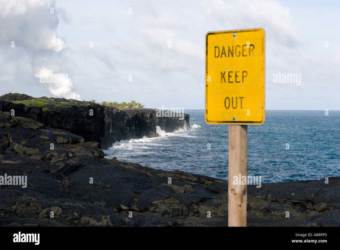 Warning sign by lava benches, on the walk out to see the fresh magma as ...