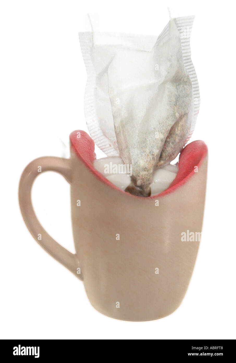 Tea Bites Back, A mug with Teeth Attacks Tea Bag Stock Photo - Alamy