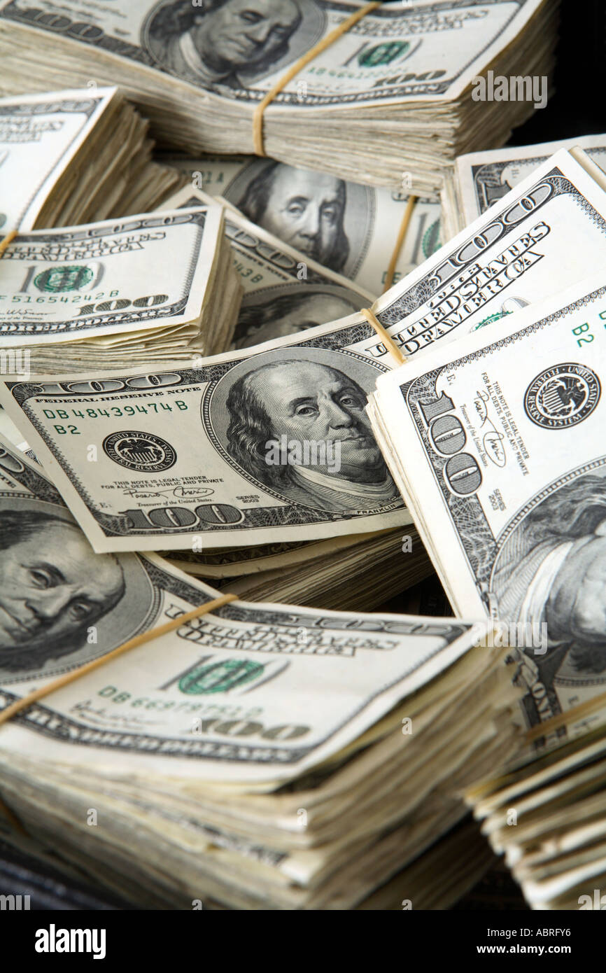 Piles of 100 dollar bills Stock Photo - Alamy